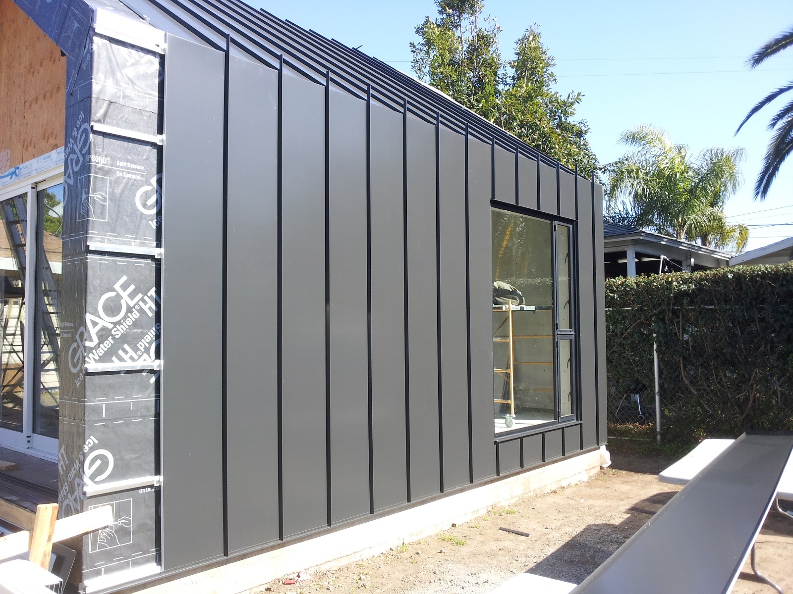 W A L N U T . H O U S E: M E T A L . C L A D D I N G