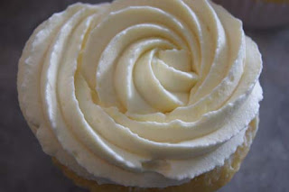 Armed with a piping bag full of buttercream.