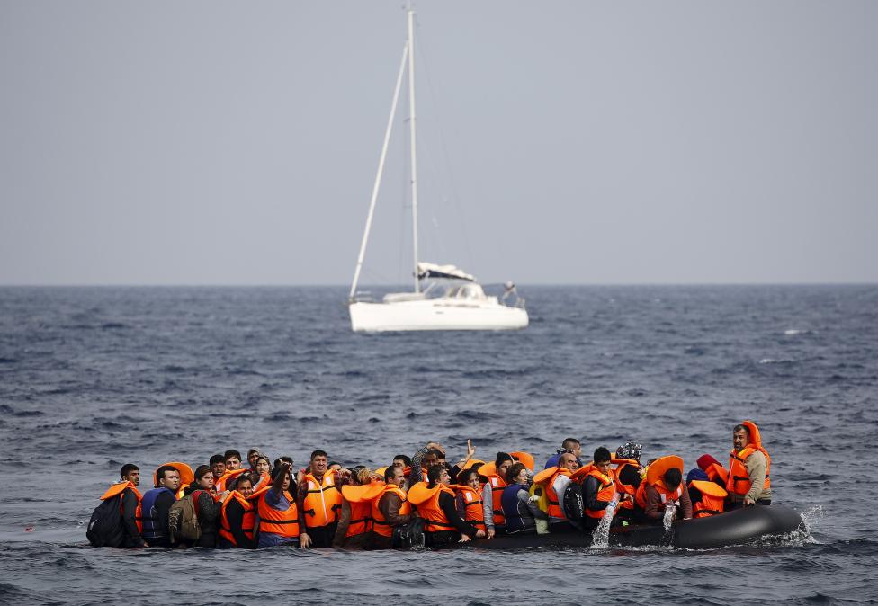 Syrian refugees call for help from their flooding raft