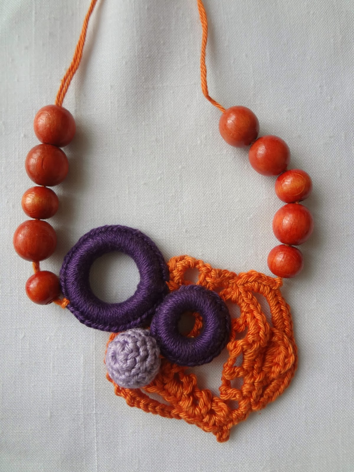 Little Treasures: Orange Arabesque Necklace