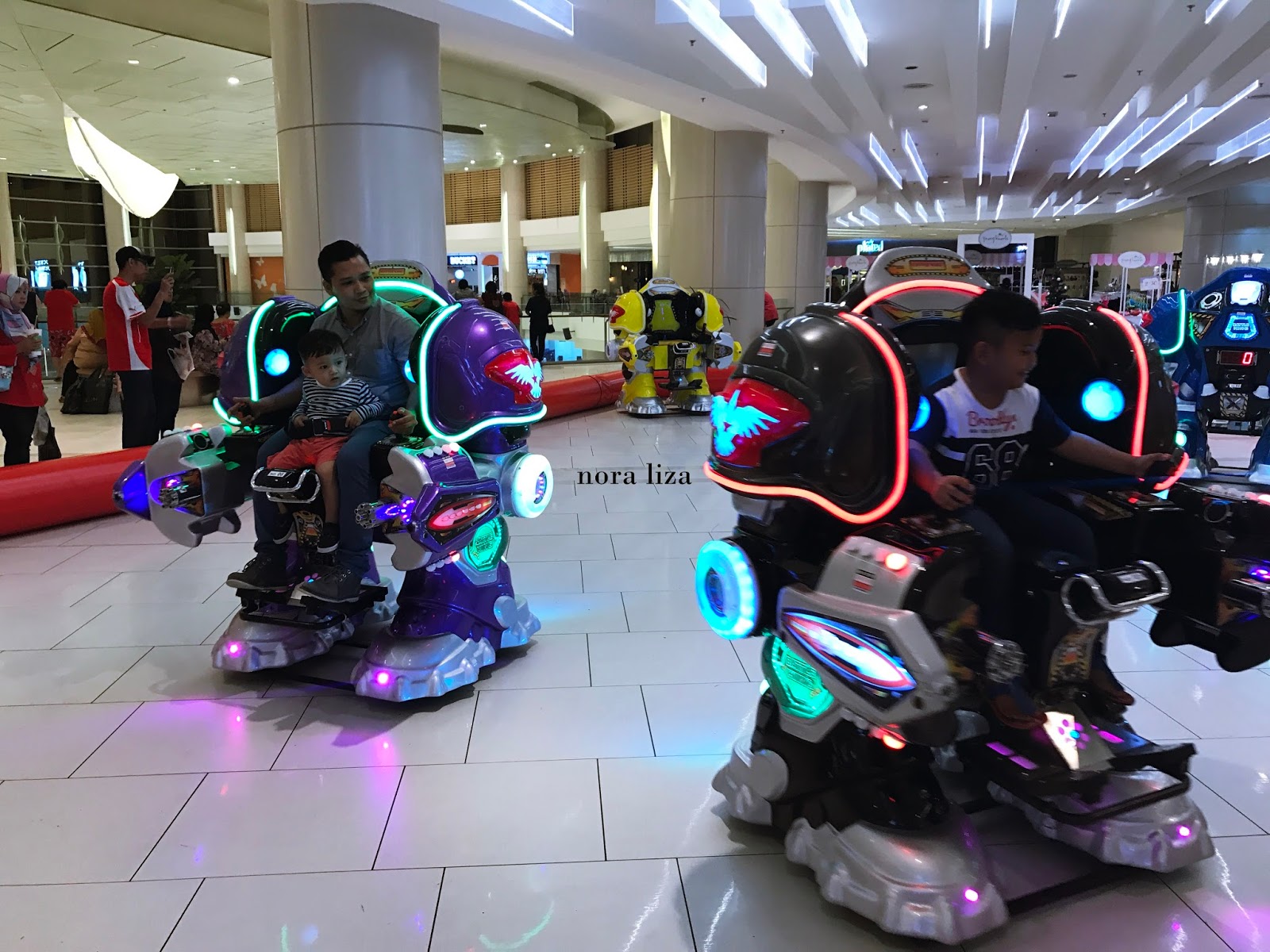 Robot Ride in IOI City Mall, Putrajaya - Nora.Liza
