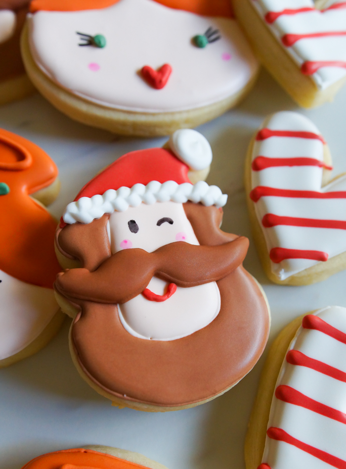 Newlywed Santa and Mrs. Claus Cookies | Bake at 350°