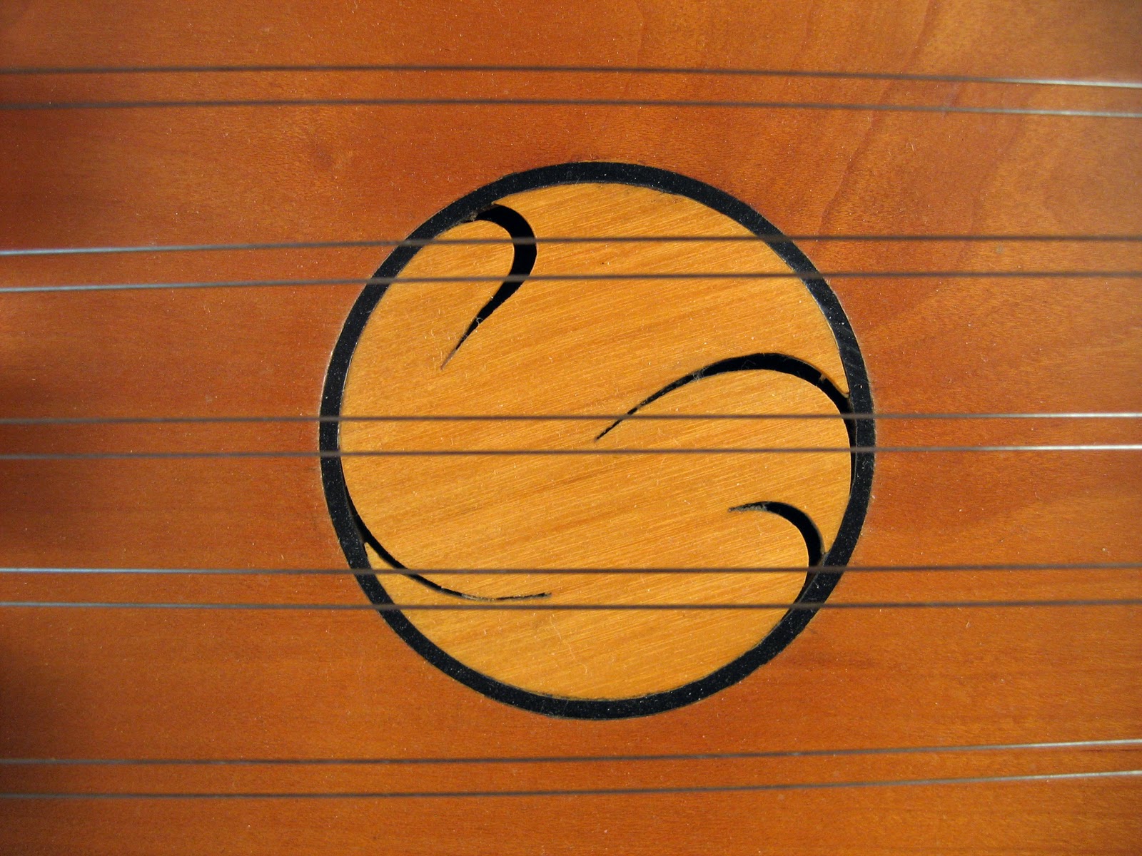 James Jones Instruments: Sound Hole Designs