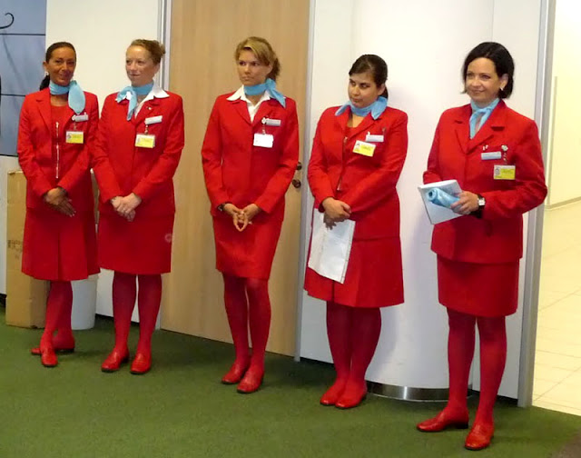 What Airline Has Red Flight Attendant Uniforms at Norman Nelson blog