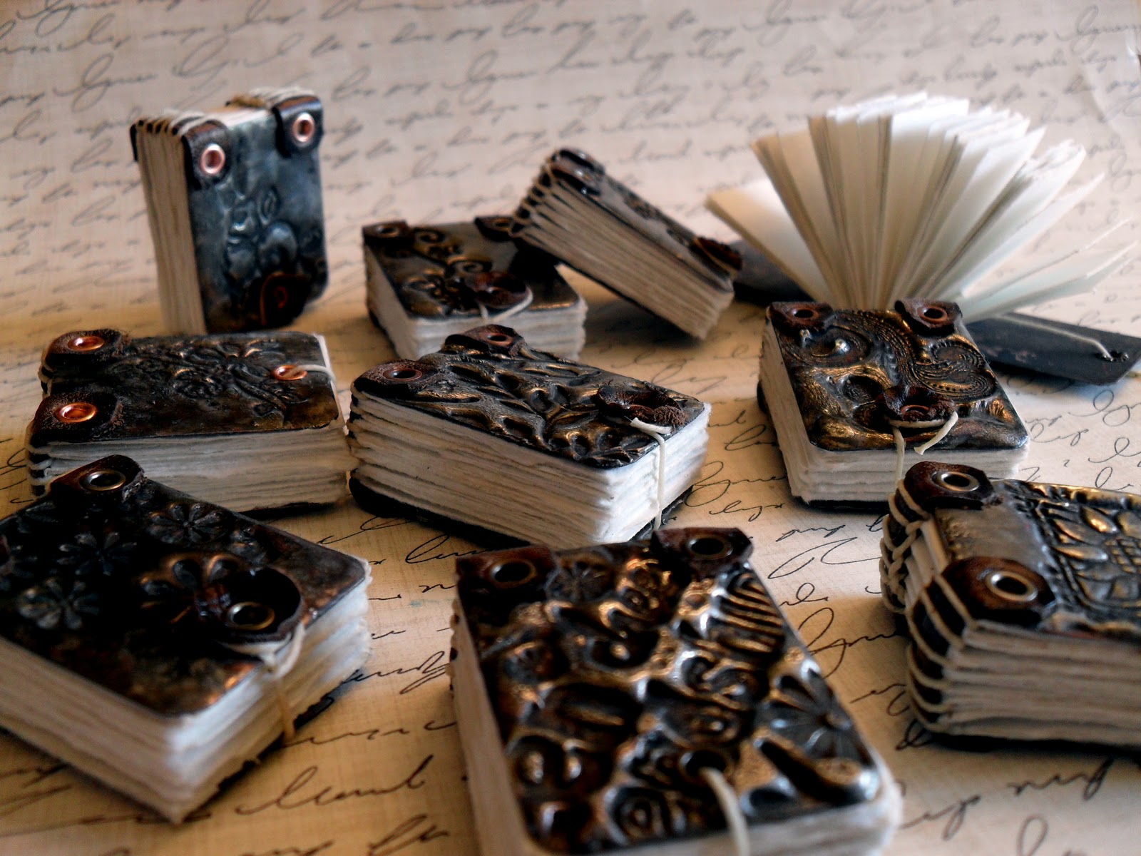 Copper, Glass and Recycled Trash: Little Metal Books