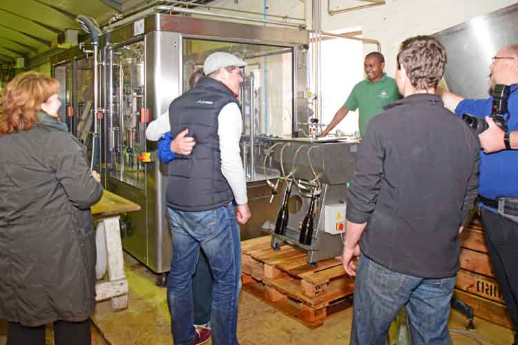 .: Bottling the Vineyard Hotel vineyard's 2016 white wine at Waterford
