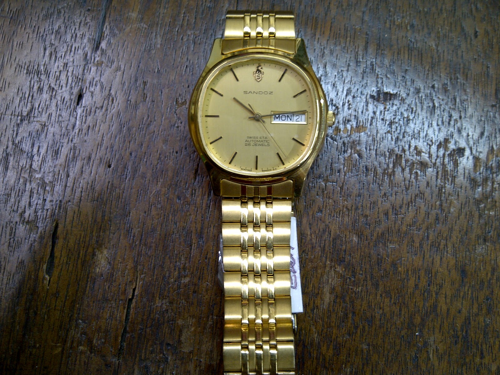 Vintage Watch: SANDOZ Rare SWISS MADE GOLD AUTOMATIC Watch