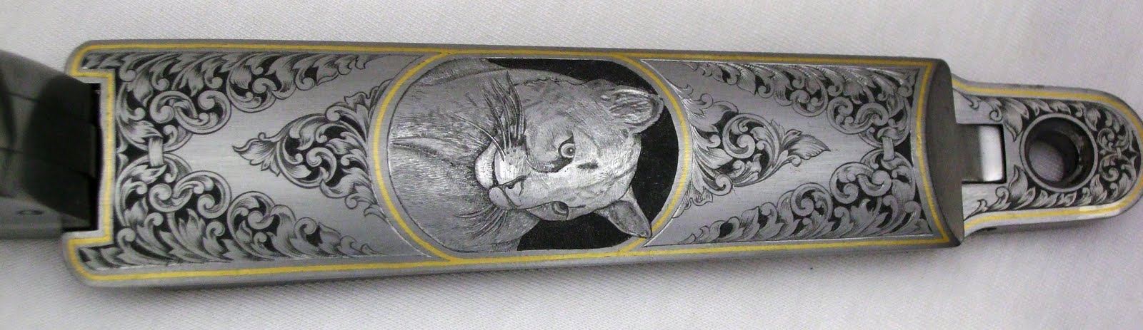 Gary Griffiths Gun Engraving: Winchester model 70 floorplate cougar