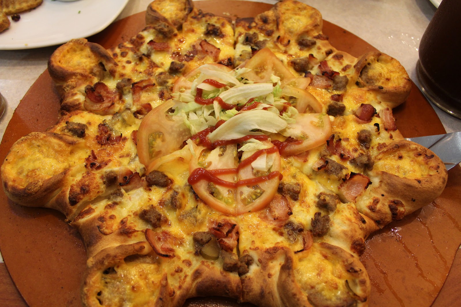 Stay, Stray, Play and Feast: Pizza Hut’s Cheeseburger Pizza