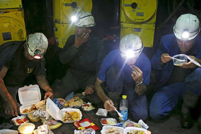 Coal miners eat as they break their fast in Bosnia and Herzegovina
