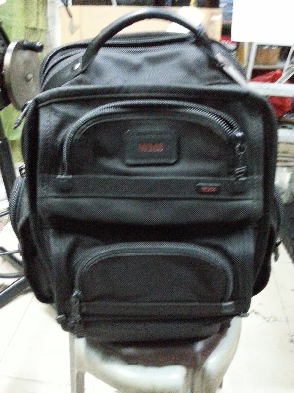 Tumi Bag Repair, tumi luggage wheel replacement, zipper repair, bag ...