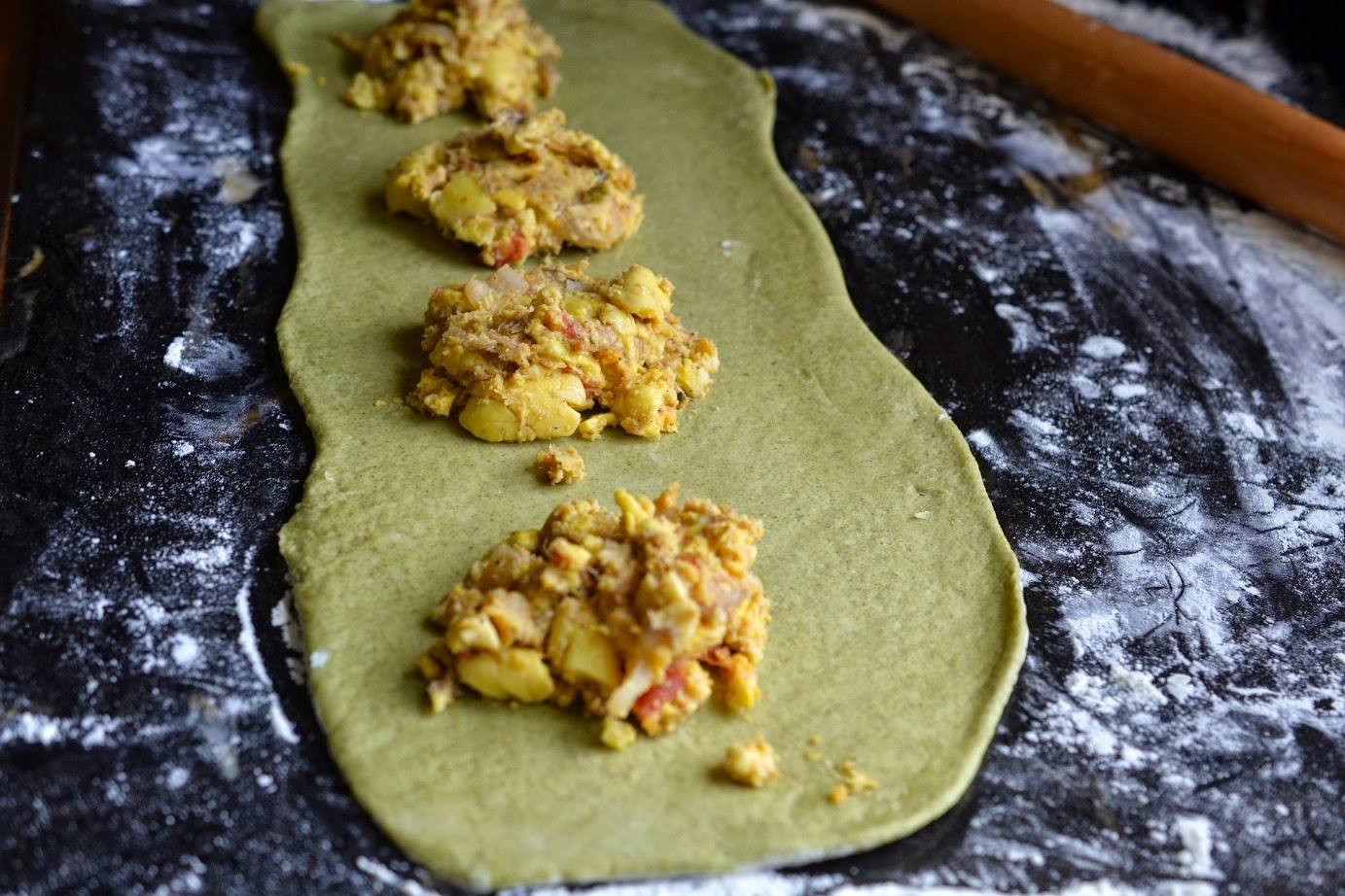 Greedy Girl : Ackee and saltfish patty in a callaloo crust