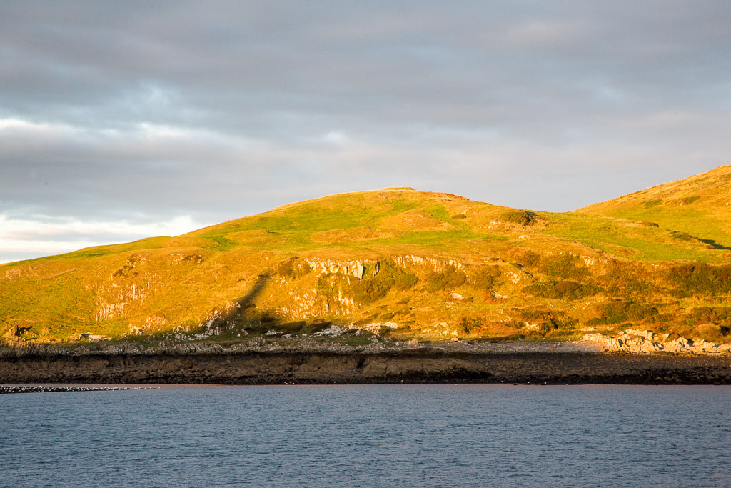 Sea kayaking with seakayakphoto.com: A shadow at dawn on Little Ross ...