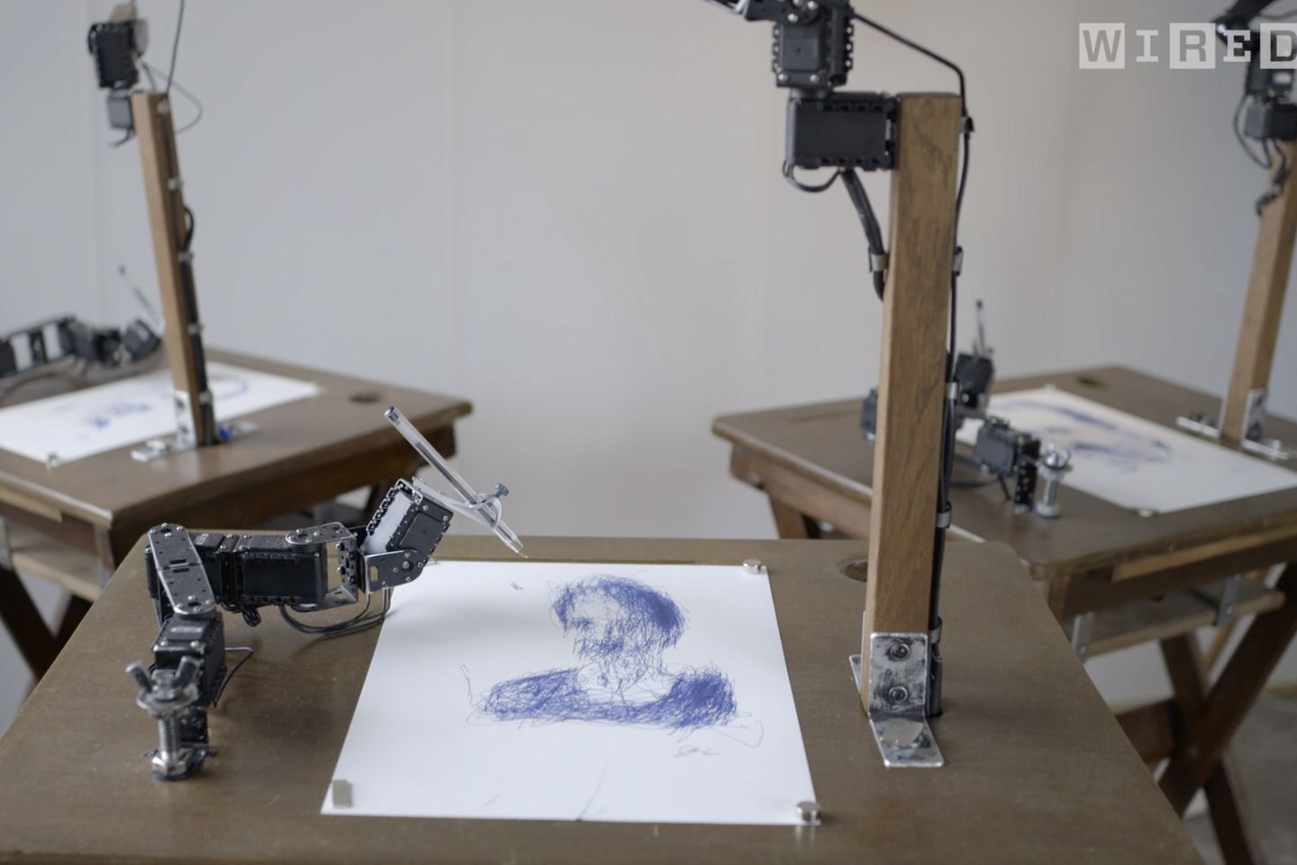 This Artist Has a Classroom of Robots That Chat, Count and Draw ...