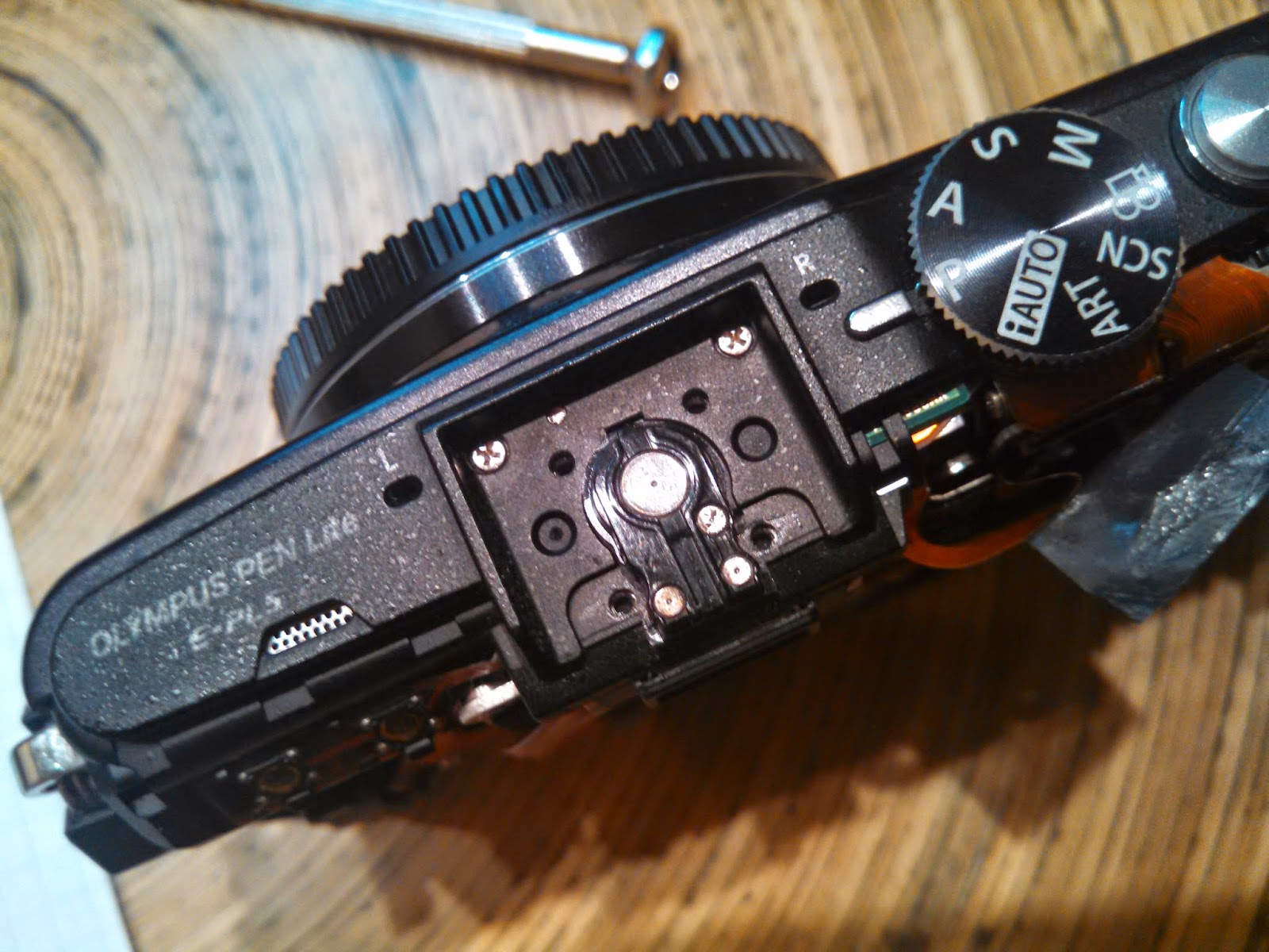 Olympus pen lite (e-pl5) Shutter button teardown ~ A travelling fool