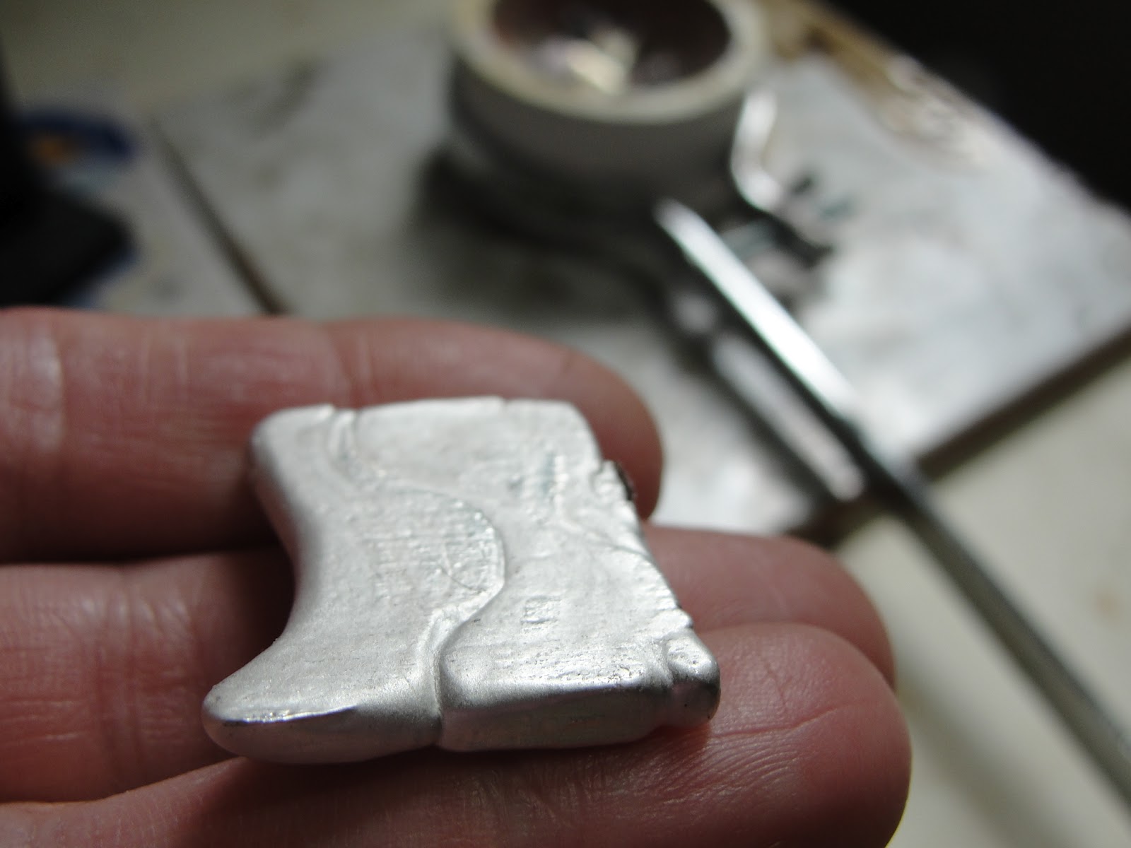small eyes, enormous things: pouring a silver ingot