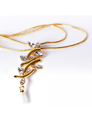 “Simplicity is the keynote of all true elegance.” : Gold Pendants For Girls