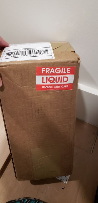 bloomingdale: package marked "to be placed upright & handled with care ...