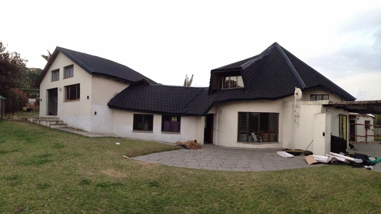 Why Convert a Thatched Roof to Tiles?