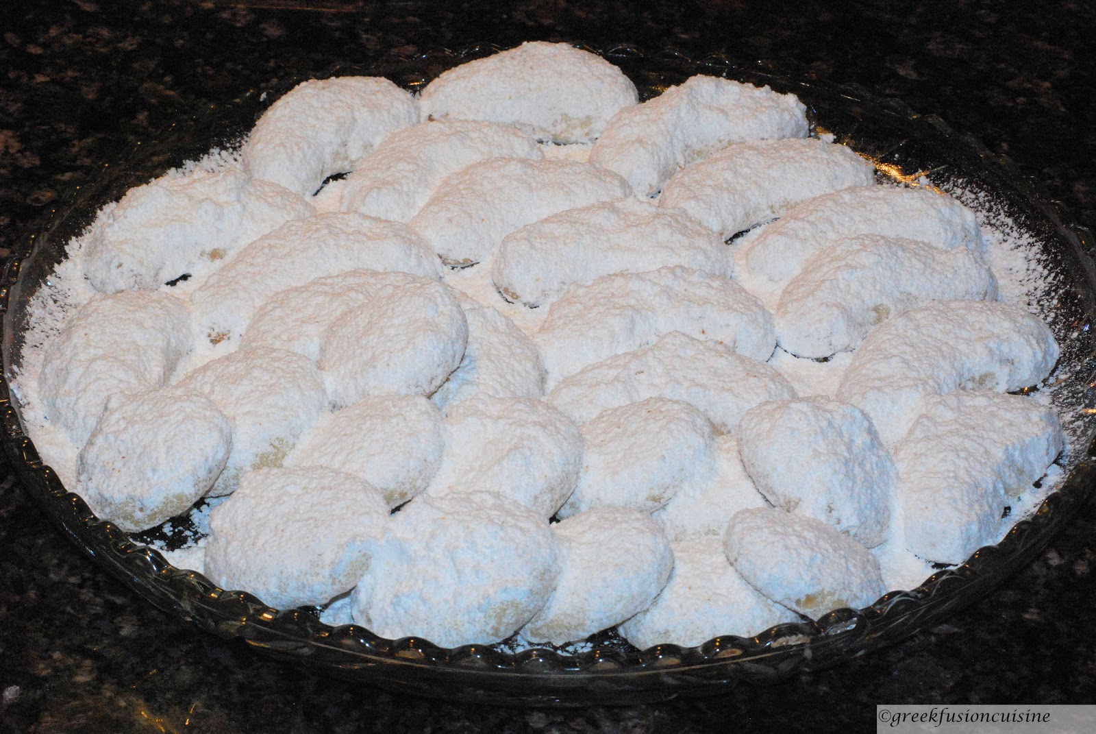 Greek Fusion Cuisine: Kourabiedes or Greek Almond Cookies in Icing sugar