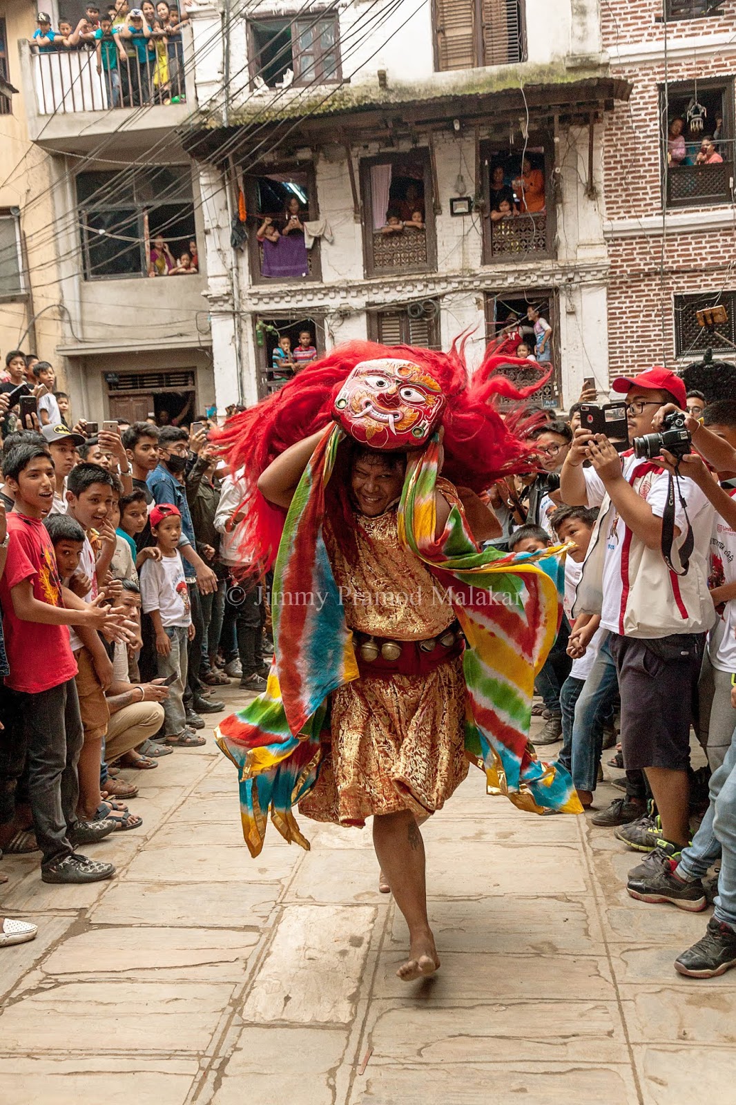 A View Through Jimmy Malakar's Lense: A mask dancer dressed as the ...
