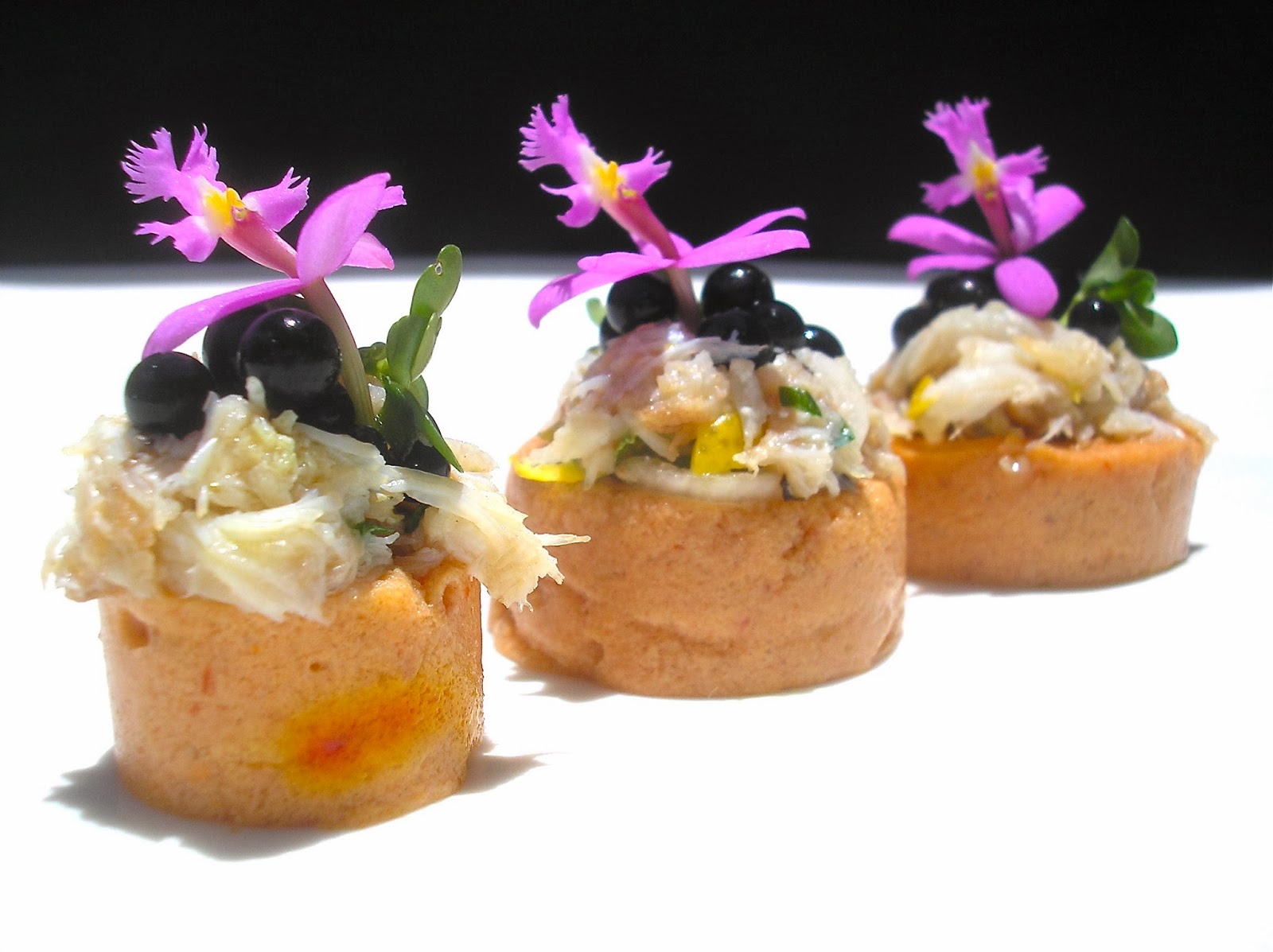 food play: ' SQUID INK CAVIAR & CRAB SALAD .' entremet