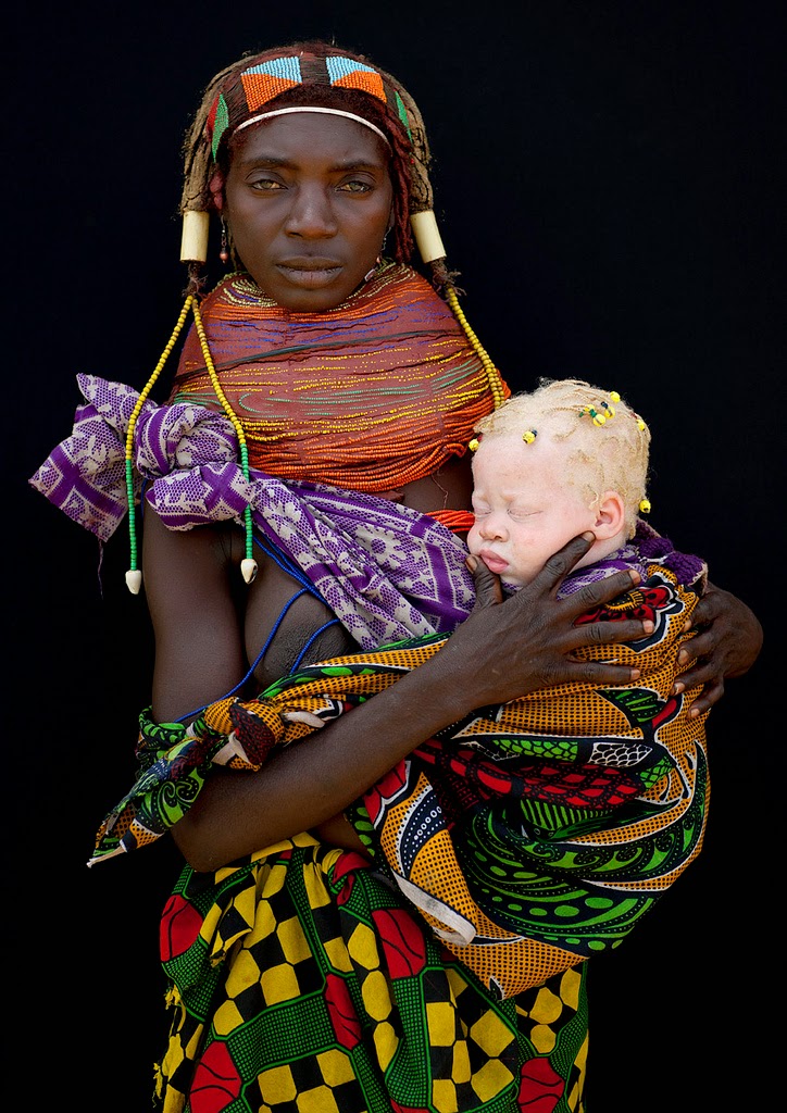 walking distance & et cetera -: Angola Traditional Clothing