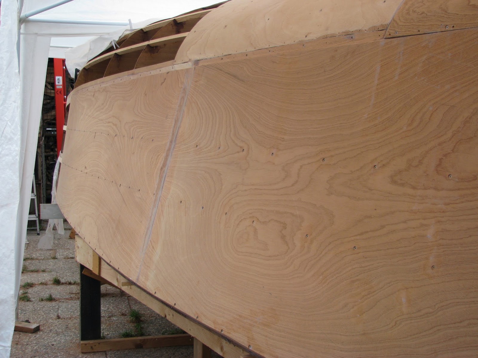 Plywood Boat Building Blog: Planking Of The Hull Continued