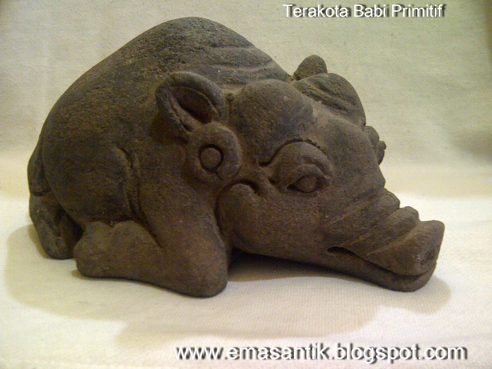 Hobby Antik: Patung Babi Primitif