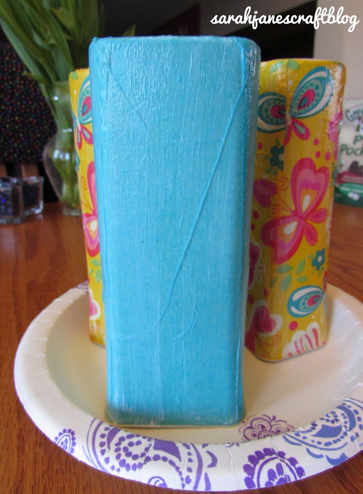 Tissue Paper and Mod Podge on Drink Mix Containers