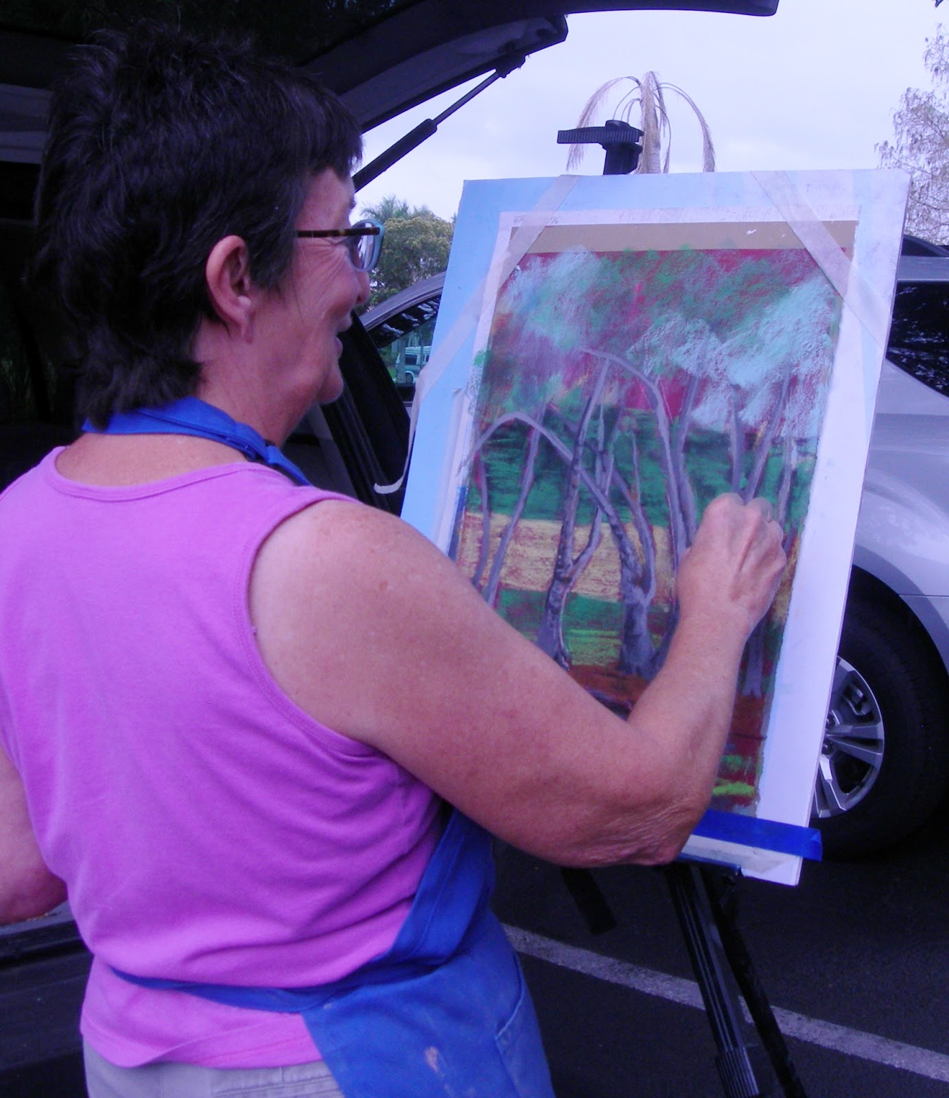 Marco Island Outdoor Artists: Nancy Norman in the rain...the lifted ...