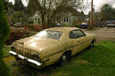 OLD PARKED CARS.: 1975 Plymouth Duster.