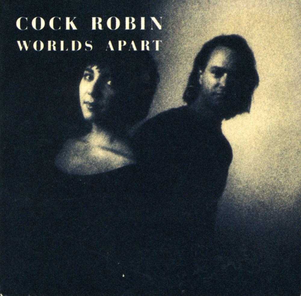 Music on CD single: Worlds apart - Cock Robin