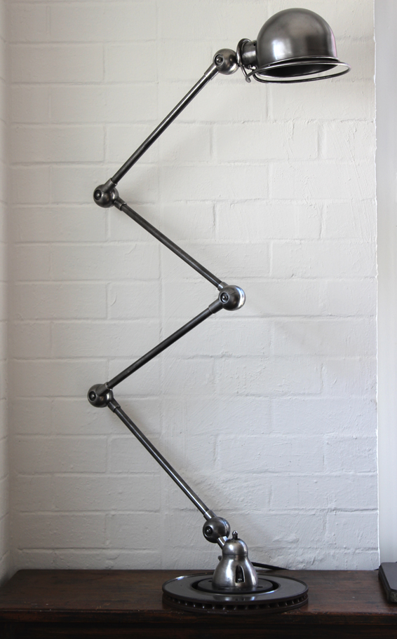 Flywheel: Stylish industrial French Jieldé lamp in the store