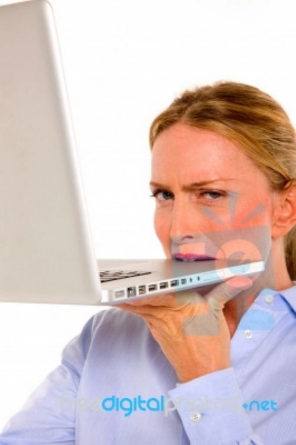 Boredom Crusher: Stock Photos Of Women Biting Laptops (And A Mouse ...