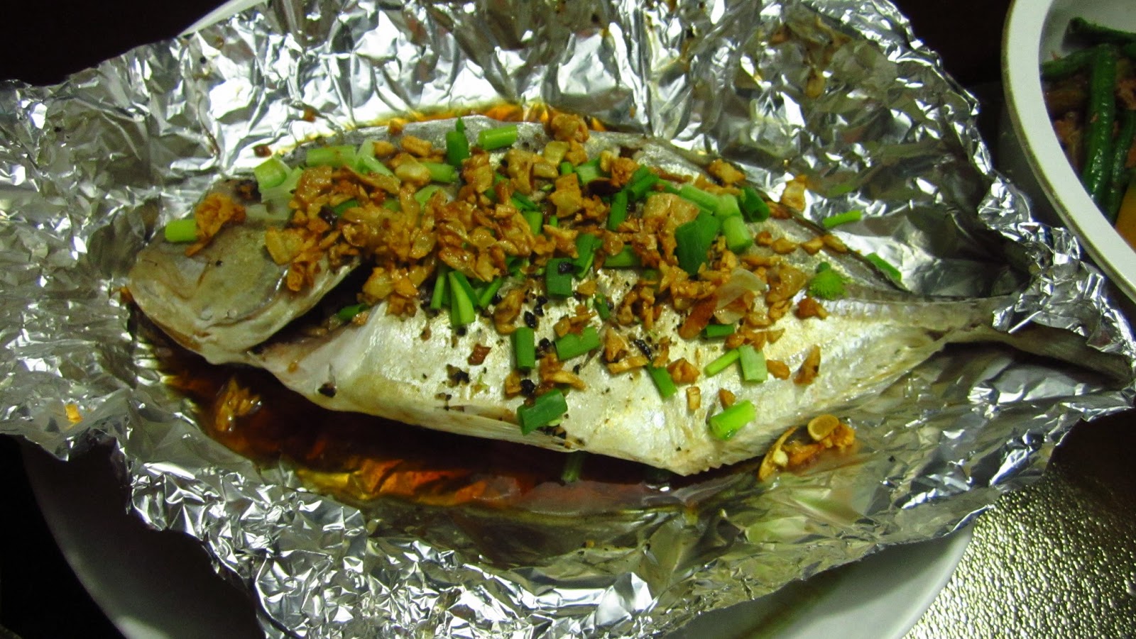 .: PINAPUTOK NA TALAKITOK WITH CRISPY FRIED GARLIC AND GREEN ONIONS