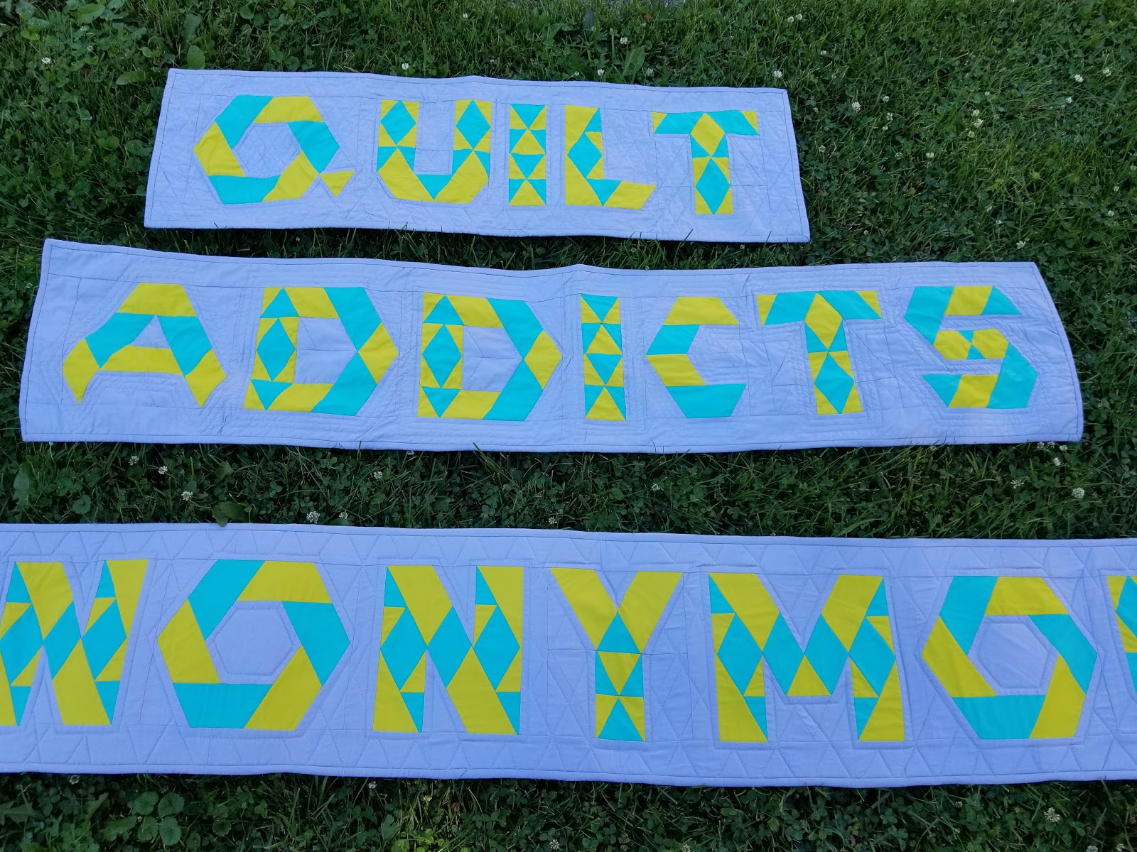 Quilting and Beyond: Q3 Finish: #21 - Banner for friend's quilt shop