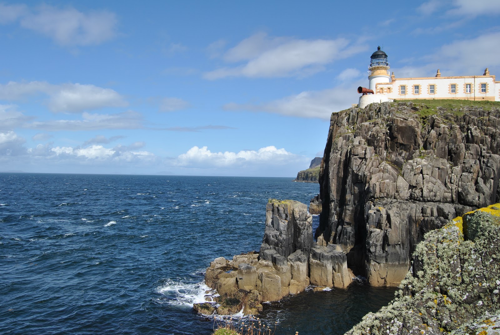 Neist Point Lighthouse In Isle Of Skye Scotland