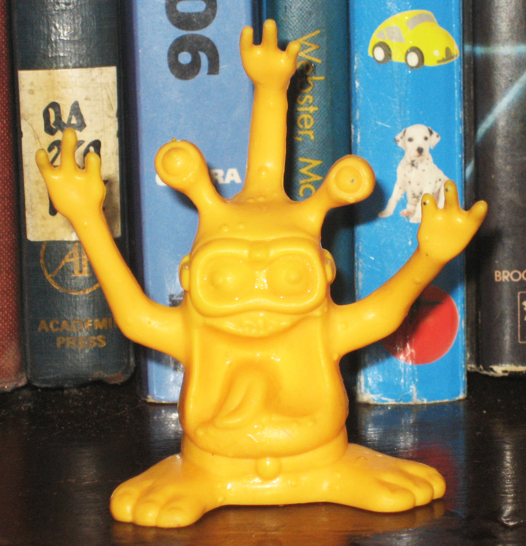 Percy's World of Toys Series 2: 3930. Yellow Alien Copyright 1991 COLPICK