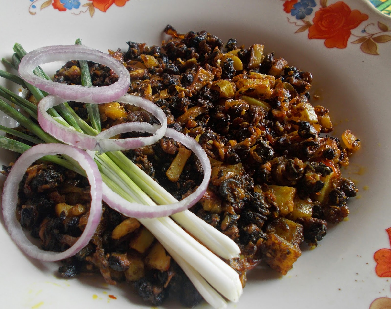 Manipuri side dishes and popular snacks: Tharoi Allu Kanghou (snail ...