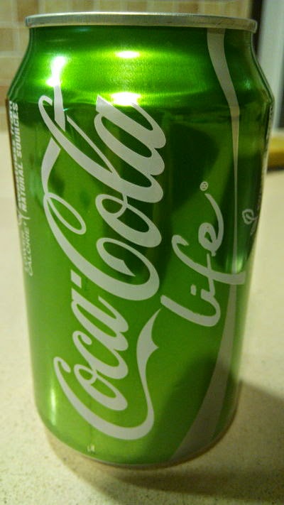 Coca Cola Life. La etiqueta verde de Coca Cola : Consume Calidad