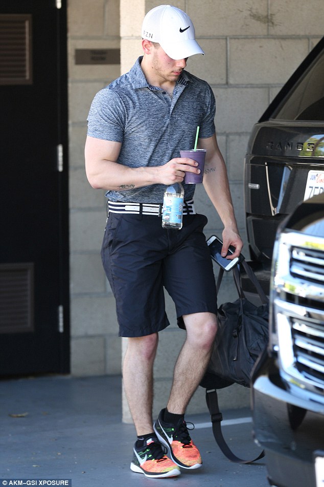 easy mese: Nick Jonas goes for preppy look wearing smart shorts and ...