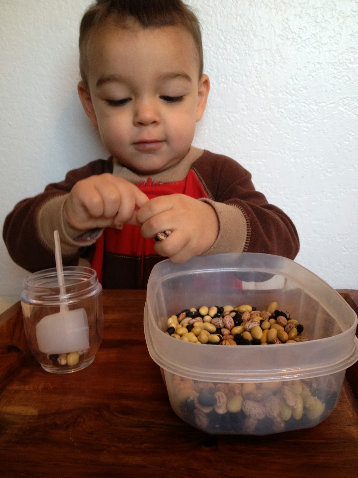 Scoop and Pour activity – Munchkins and Moms