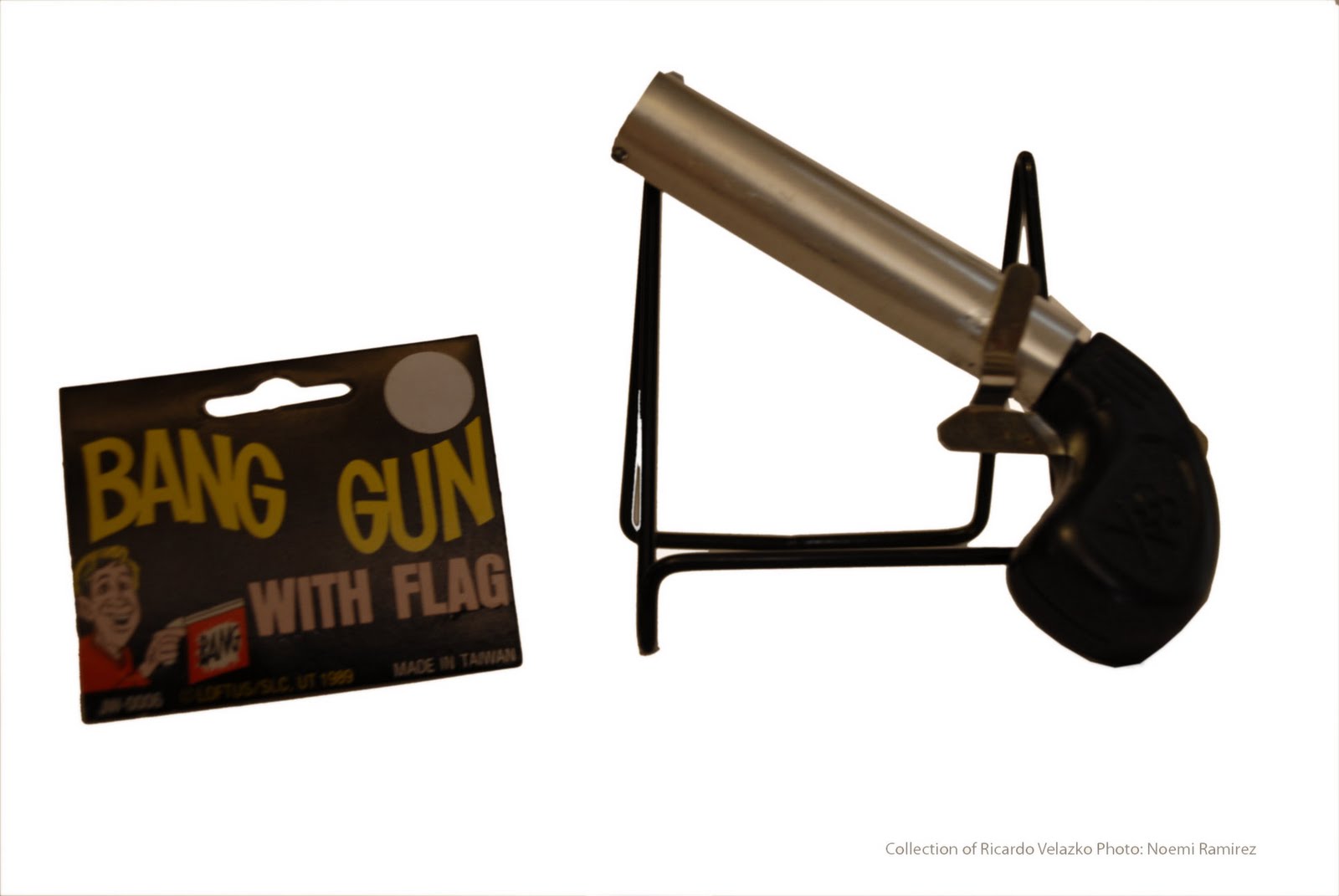 Burden of memories: Bang gun with flag