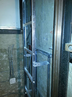 Chicago Elevator Maintenance - Colley Elevator: Retractable ladders ...