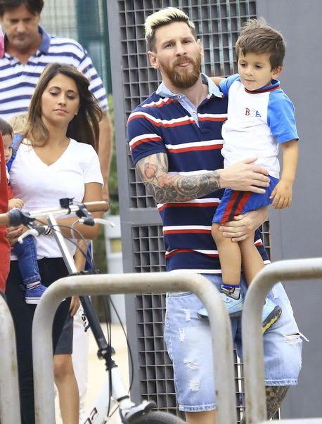 Doting superstar dad Lionel Messi picks up his son from school looking ...
