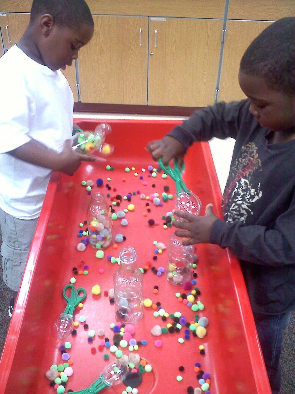 Coyne's Crazy Fun Preschool Classroom: Sensory table with tongs and bottles
