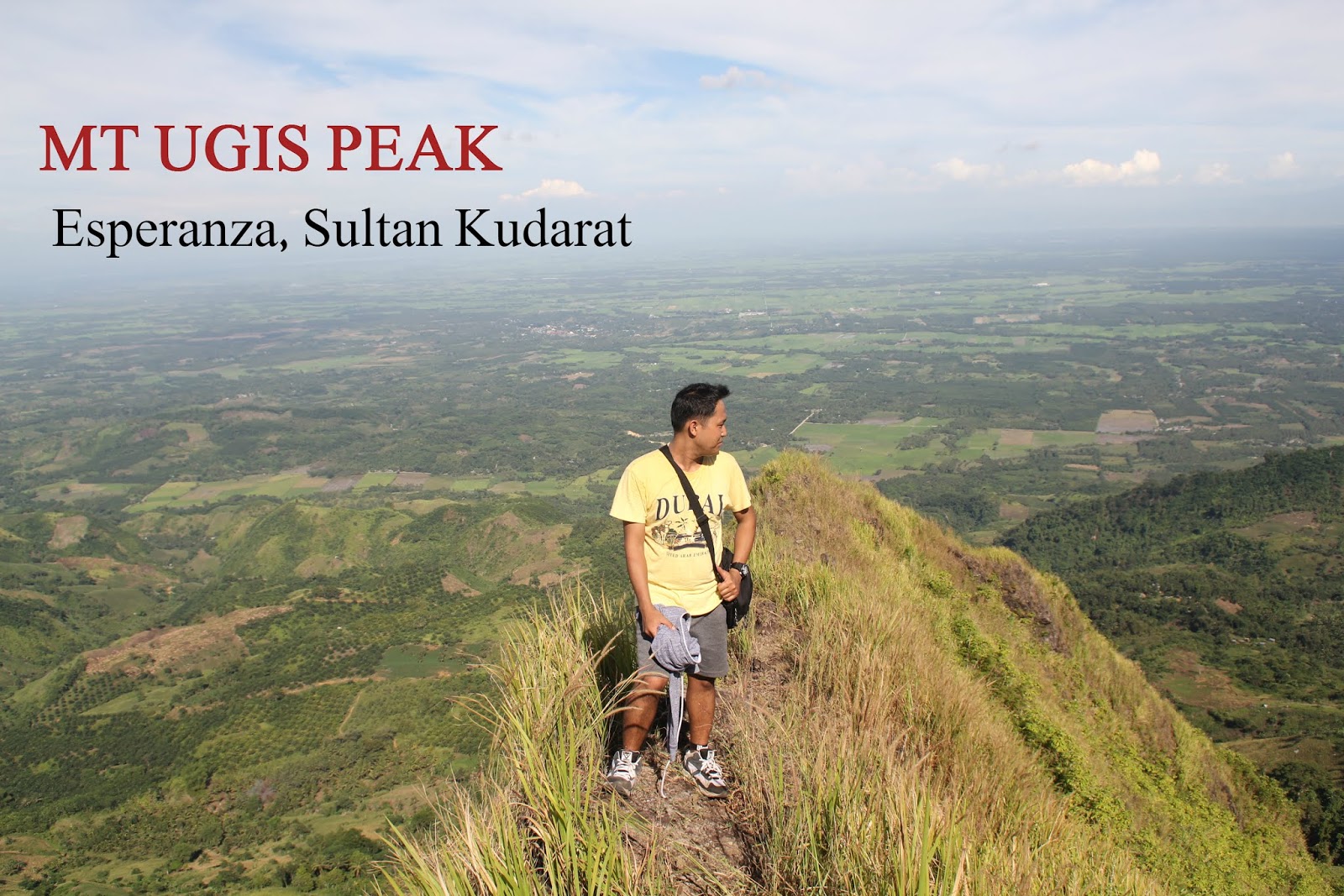 Standing at the Knife Edge of Mt. Ugis Peak