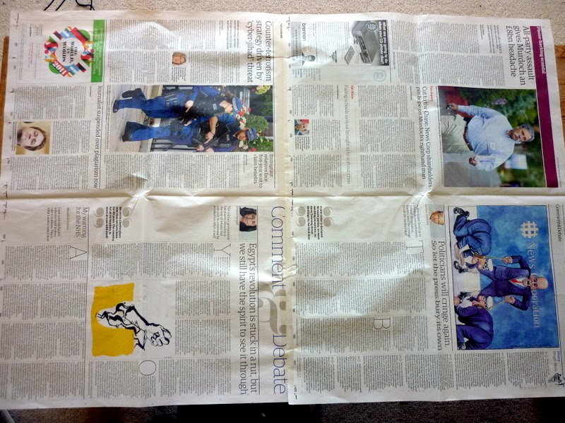 sixty one A: Recycled paper helmet