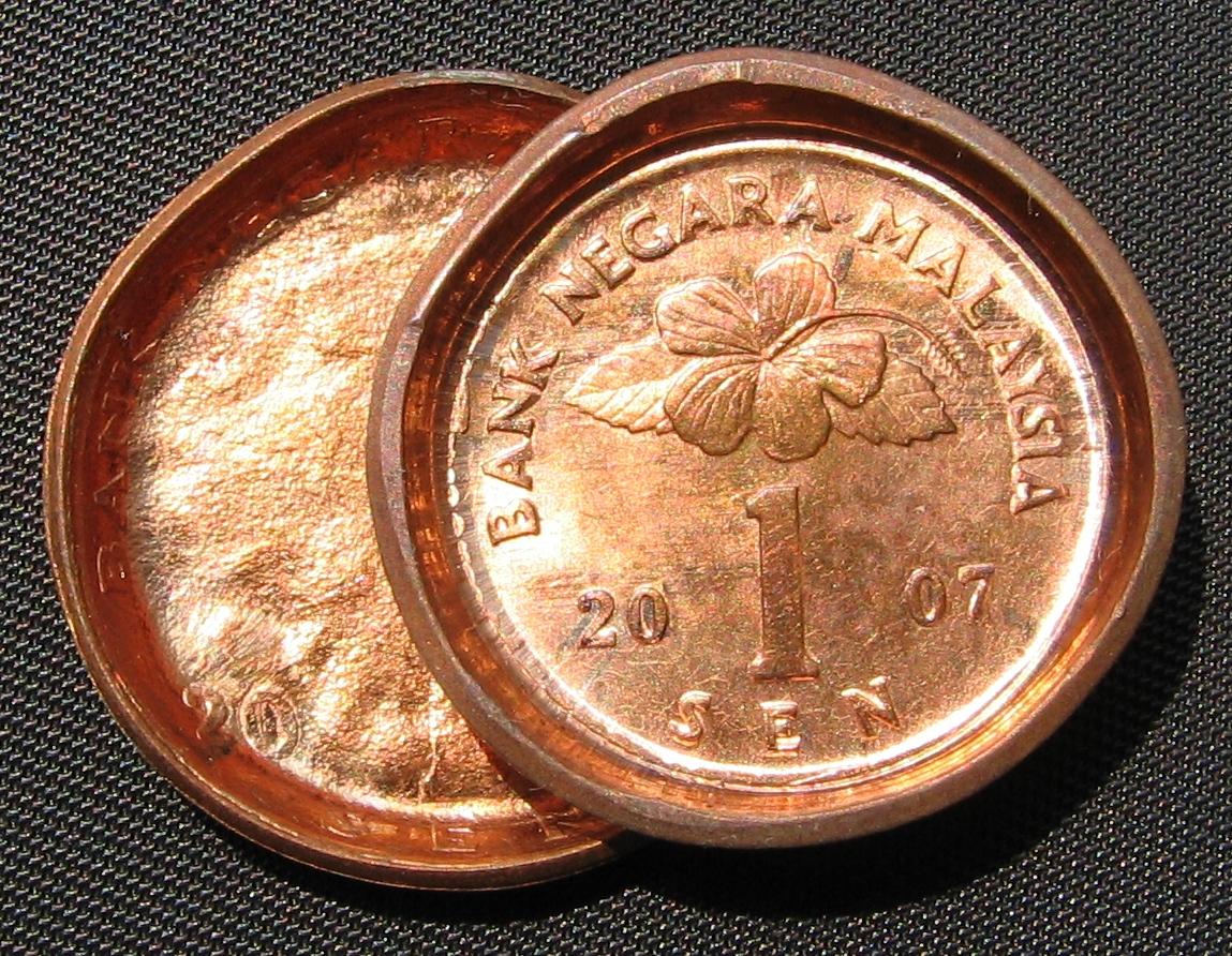 DIE CAP AND CAPPED DIE STRIKE COIN SET. | Error coins